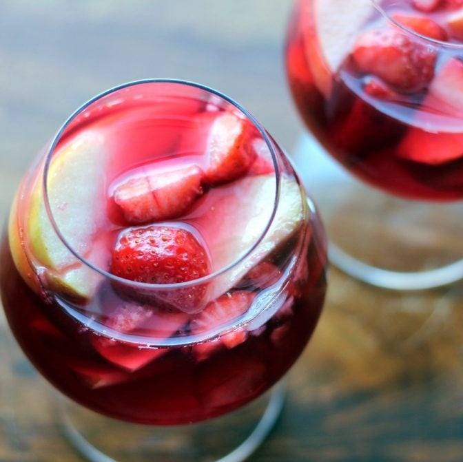 Cranberry Red Wine Punch with Apples & Strawberries - Ambitious Kitchen