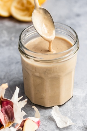 The BEST Creamy Tahini Sauce Recipe | Ambitious Kitchen